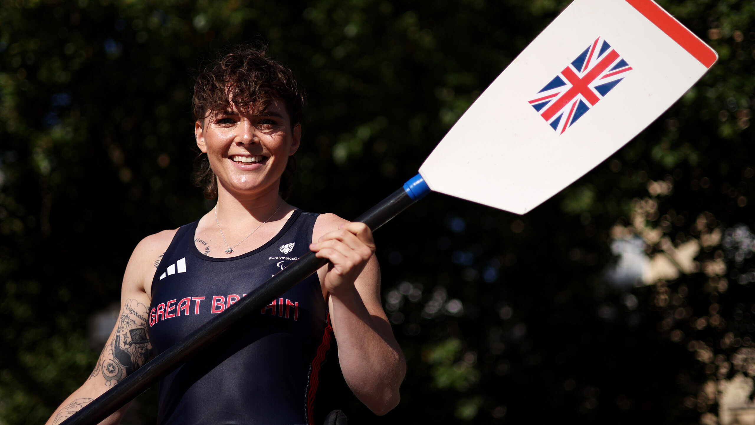 Gay rowing champ Lauren Rowles sets world best at Paralympics - Outsports