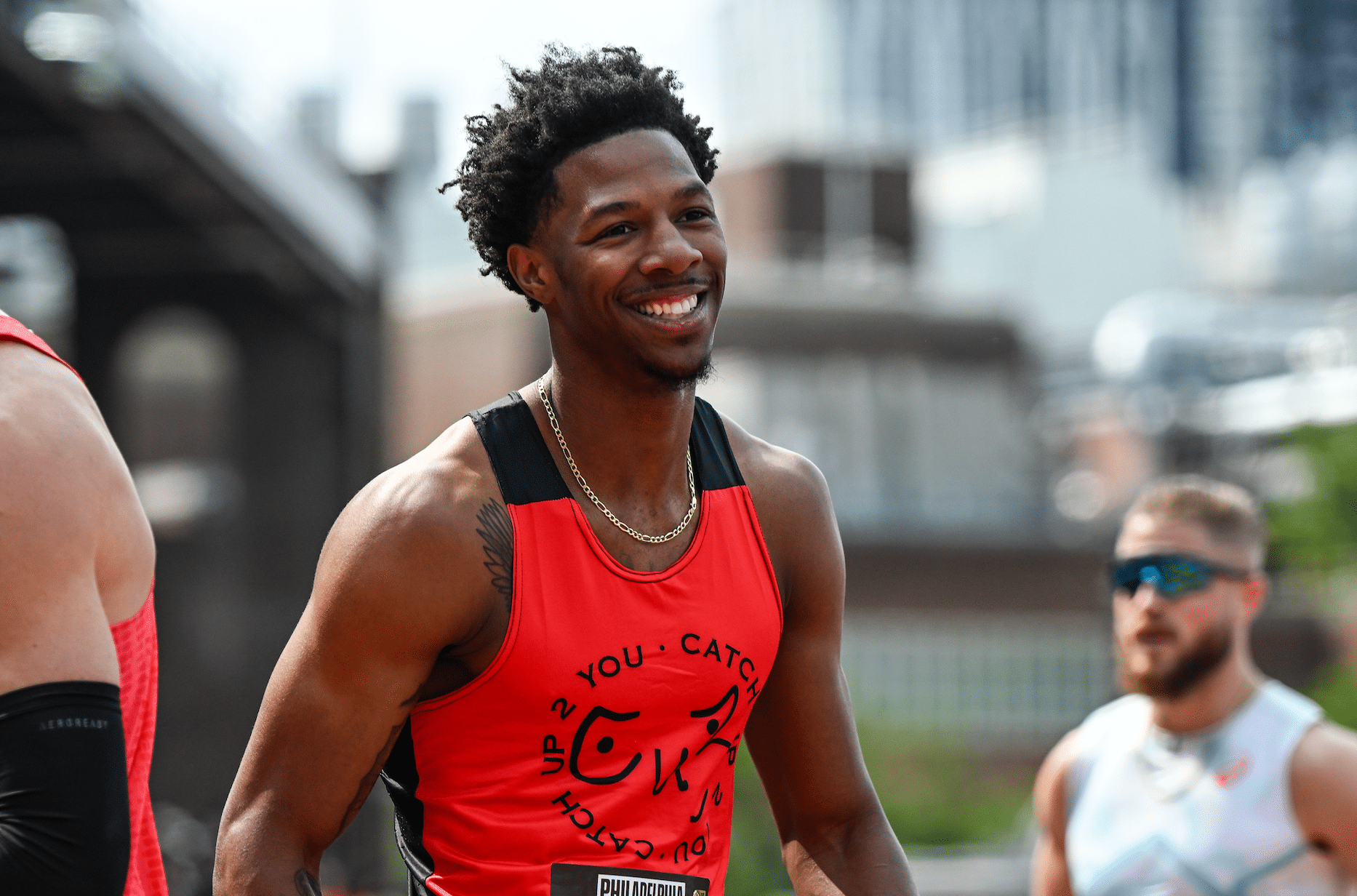Chris Robinson wins hurdles while adjusting his private parts - Outsports